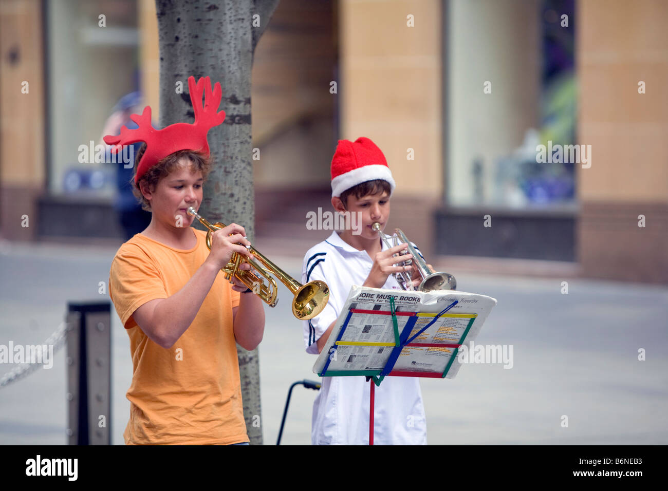 two boys busking Stock Photo - Alamy