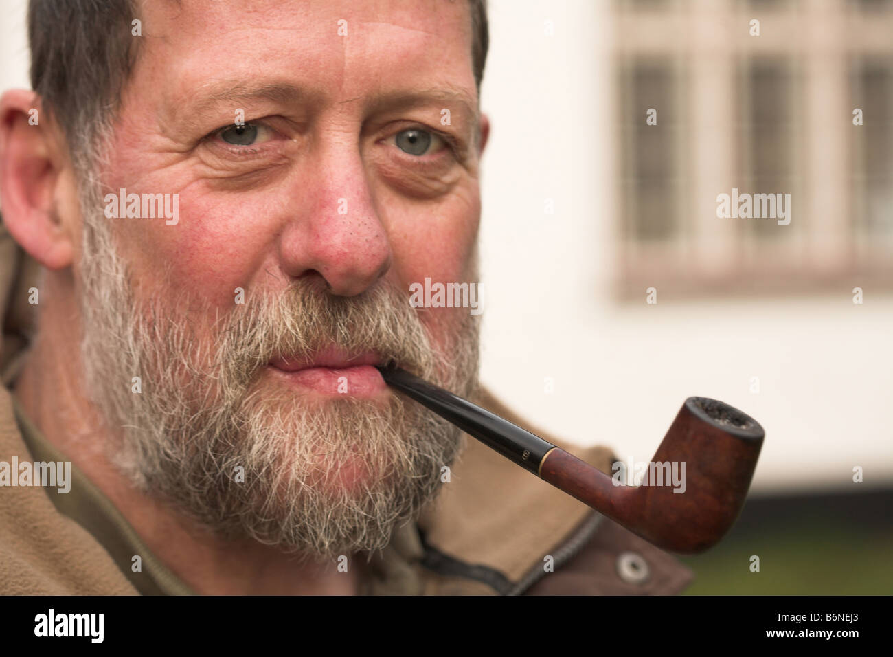 Man smoking a pipe Stock Photo - Alamy