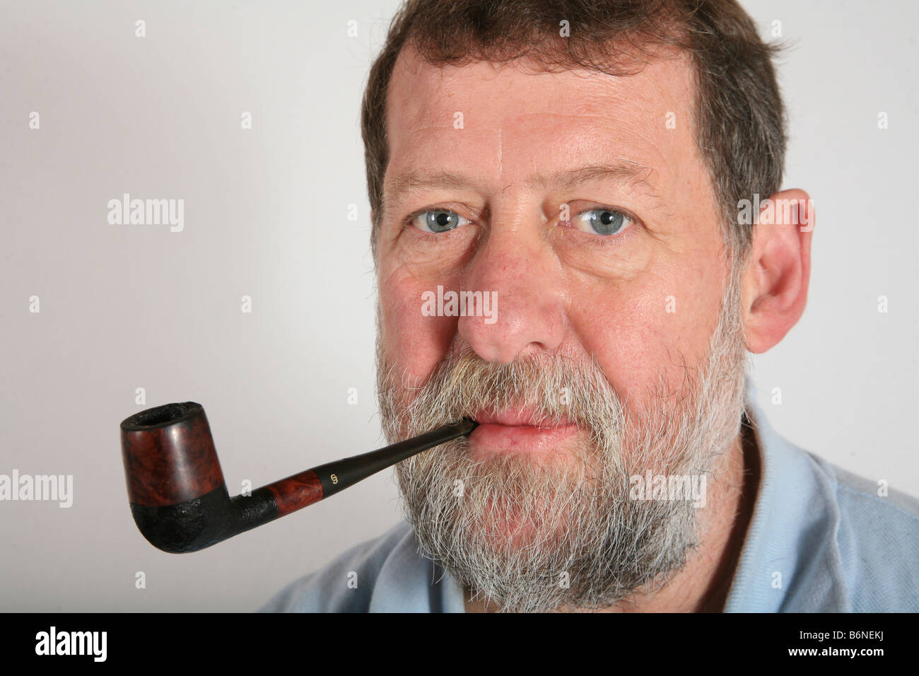 Man smoking a pipe Stock Photo - Alamy