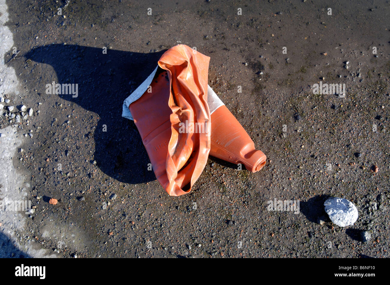 Traffic cone on broken hi-res stock photography and images - Alamy