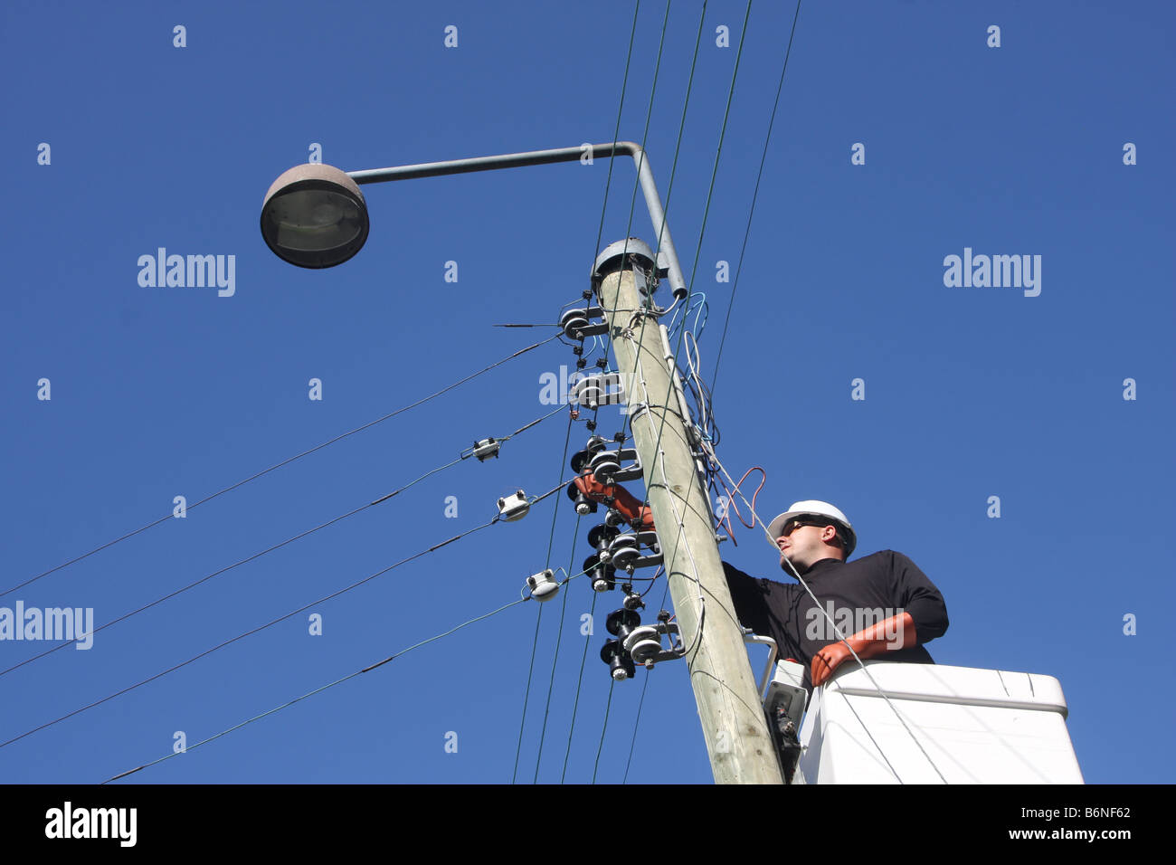 man working on electrical wire in Denmark Stock Photo - Alamy