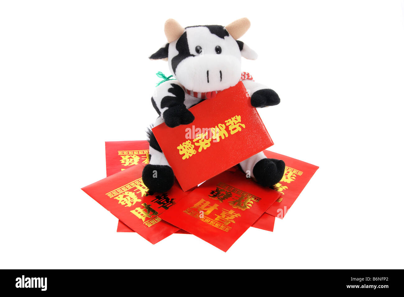 Soft Toy Cow and Lucky Money Envelopes Stock Photo - Alamy