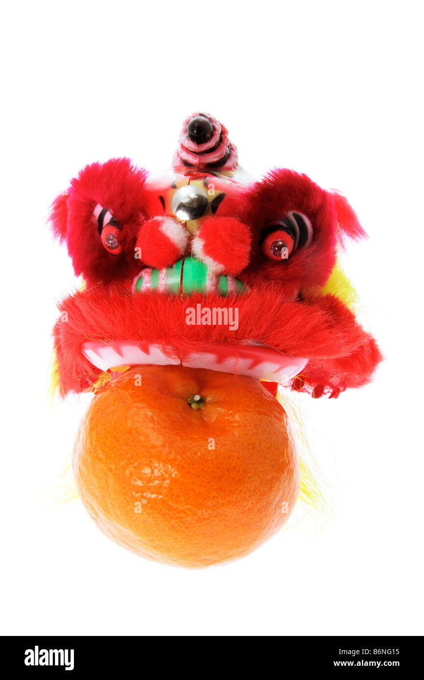 Miniature Lion Dance and Mandarin Stock Photo - Alamy