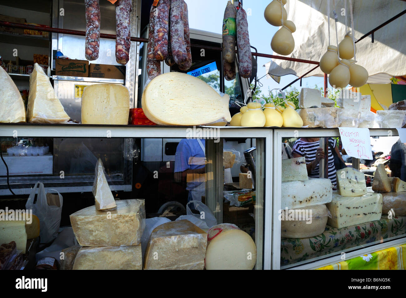 Cheese stall on the Market at Giardini Naxos near Taormina in Sicily ...