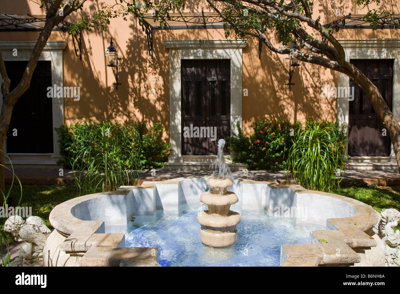 Traditional Mexican courtyard with fountain Stock Photo - Alamy