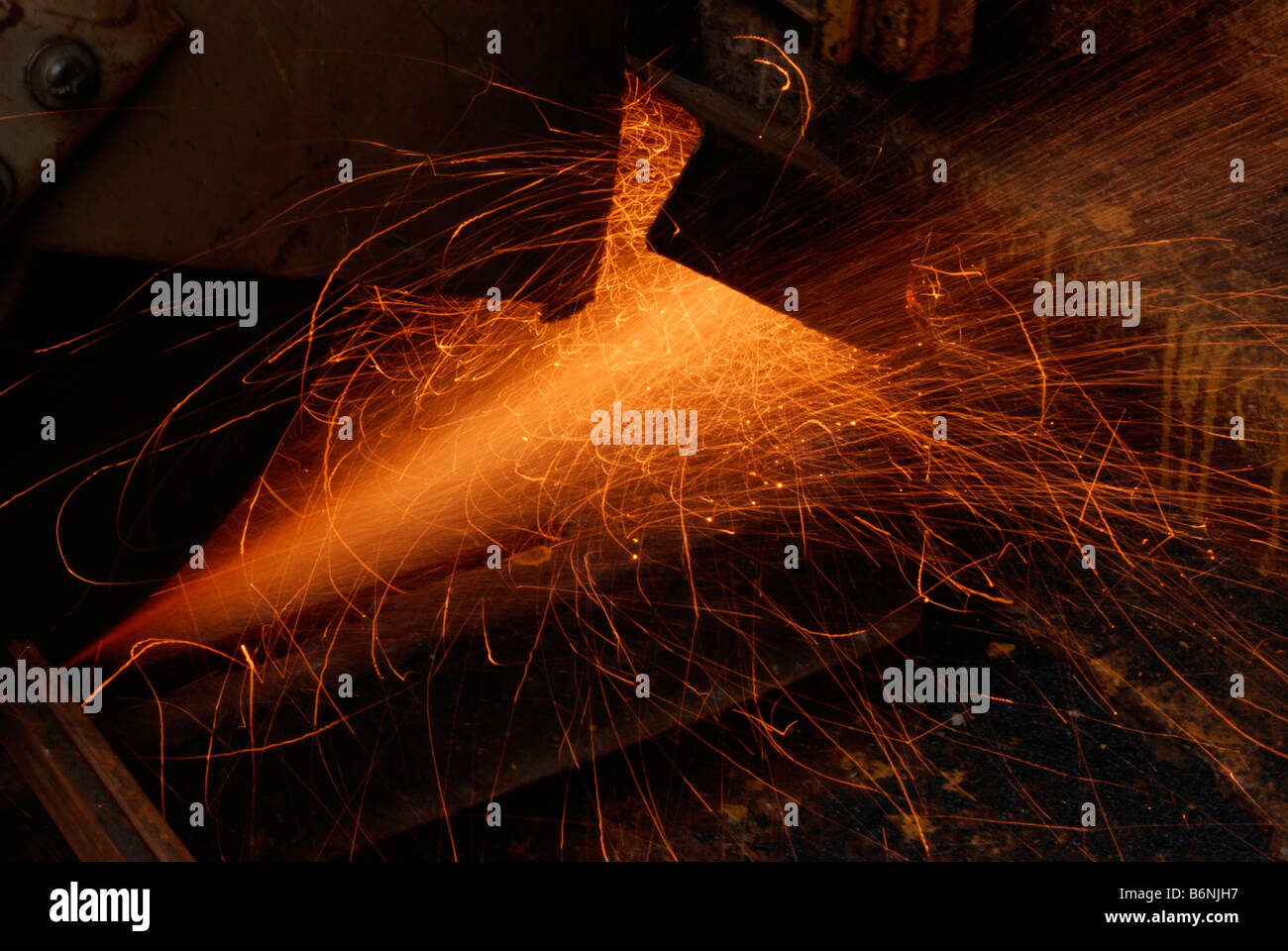 spark formed by cutting of metal pieces Stock Photo - Alamy
