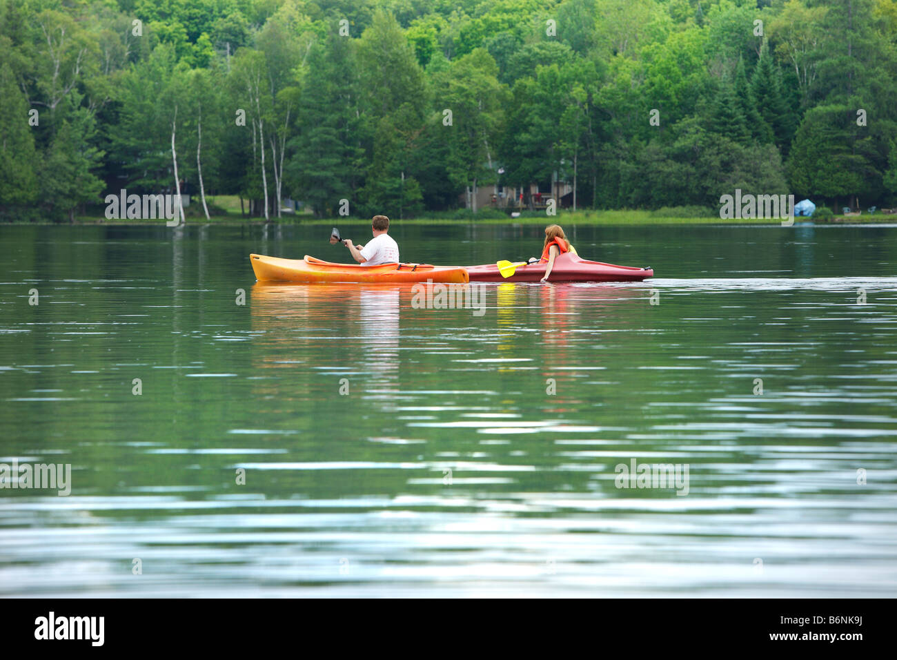 canoers on lake Stock Photo - Alamy