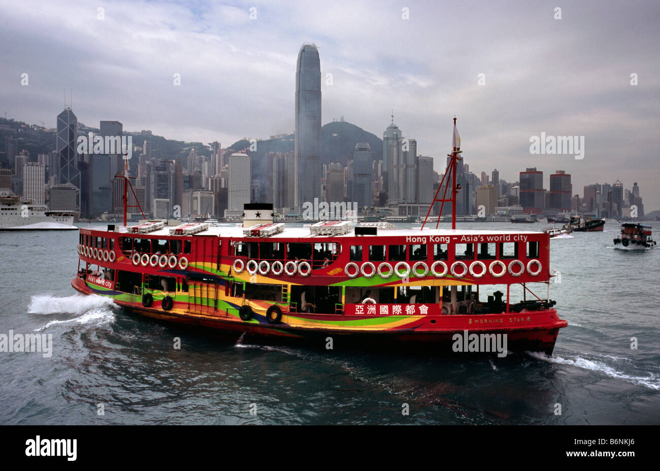 Star Ferry arrives at Tsim Sha Tsui pier in Kowloon after having crossed Victoria Harbour from ...
