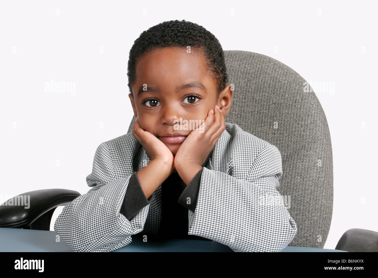Young African American boy thinking Stock Photo - Alamy
