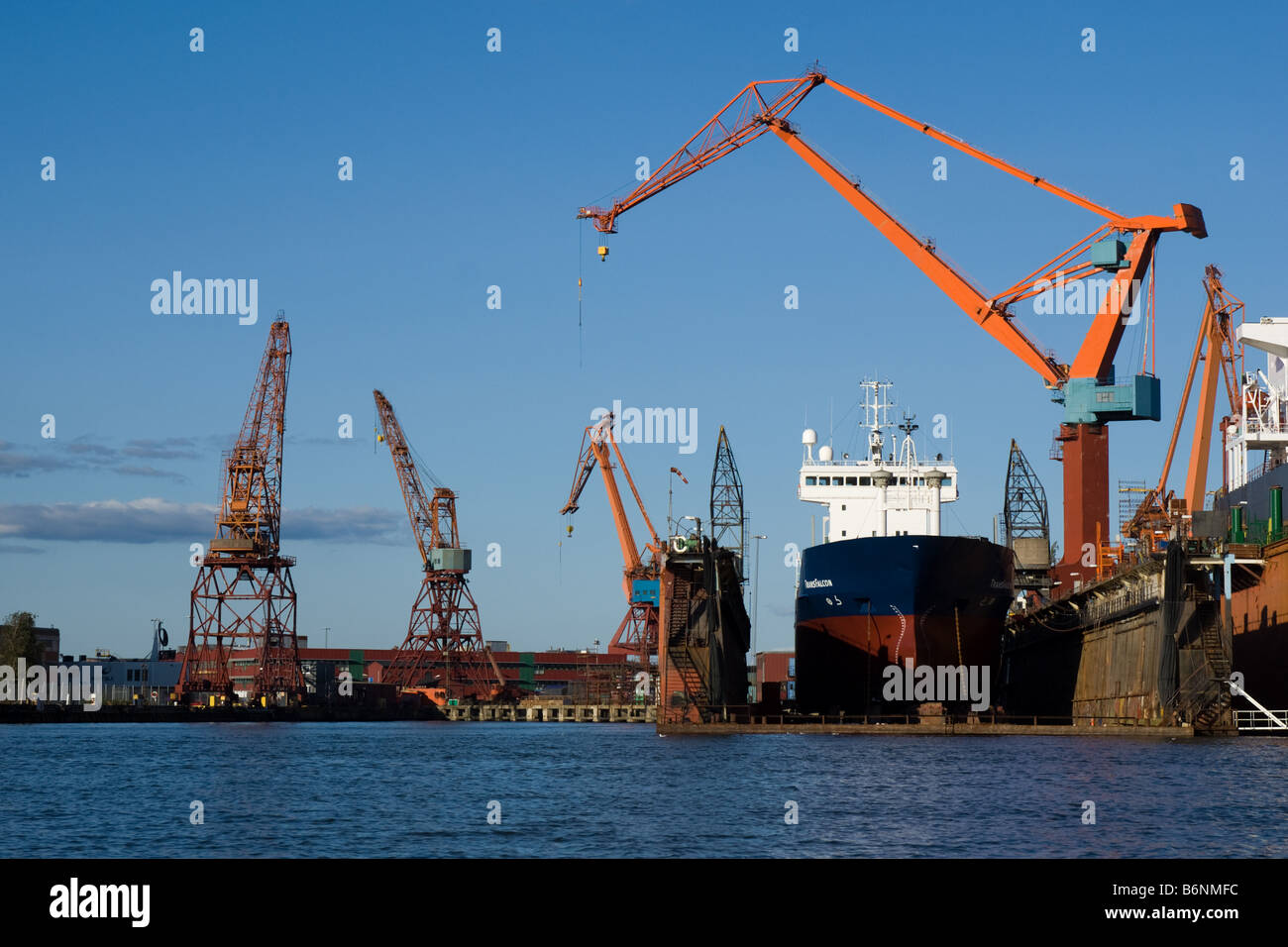 Cranes and floating dry dock in shipyard, Gothenburg, Sweden Stock ...