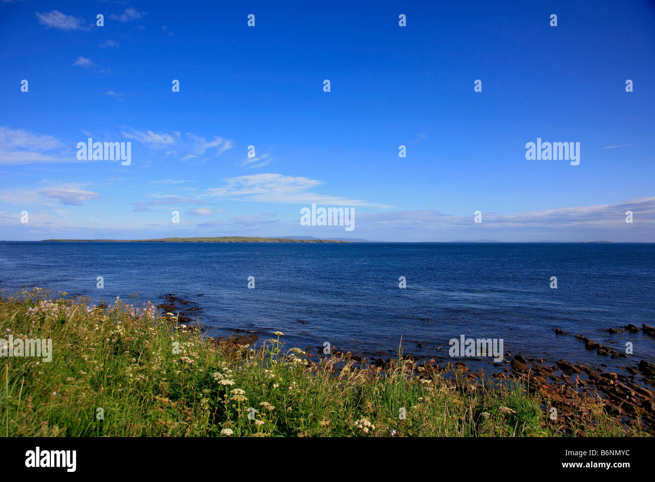 Landscape view to Stroma Island from John O Groats harbour Caithness ...