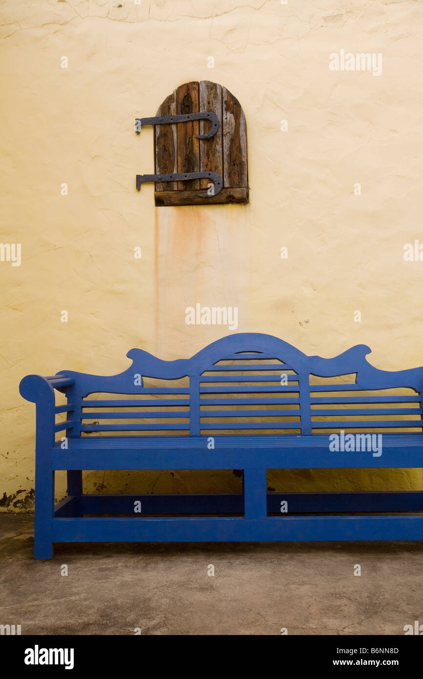 Ghana, west coast, Fete village. Wall and bench, White Sands Resort ...