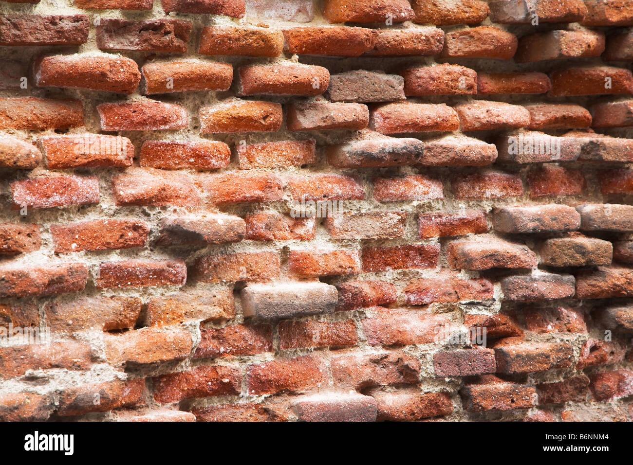 Not restored wall of an old bricklaying Stock Photo - Alamy