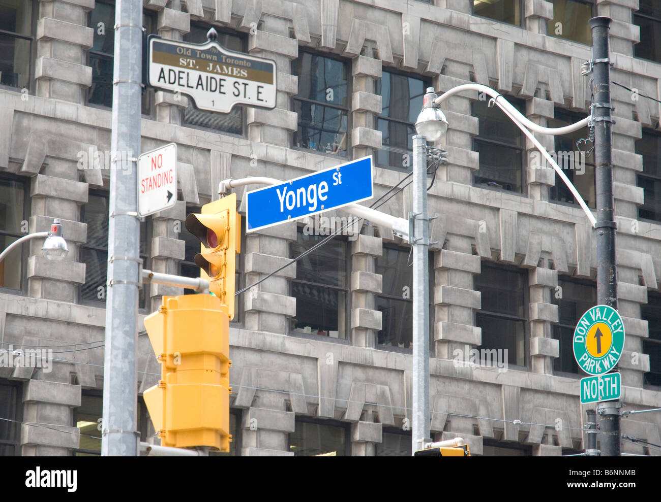 street sign at the junction of yonge street and adelaide street east in ...
