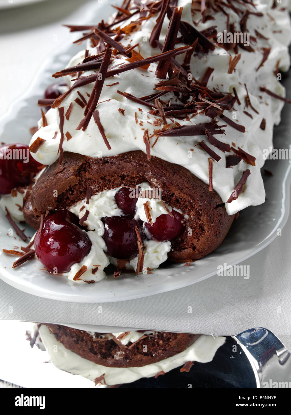 Frosted christmas chocolate log dessert hi-res stock photography and ...