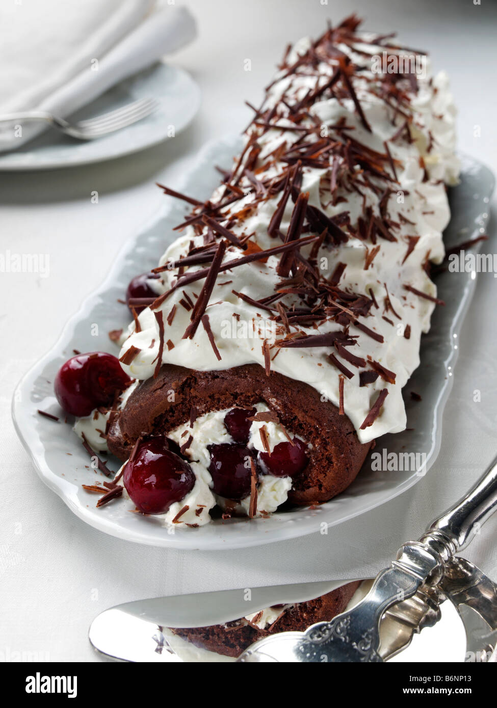 Frosted christmas chocolate log dessert hi-res stock photography and ...