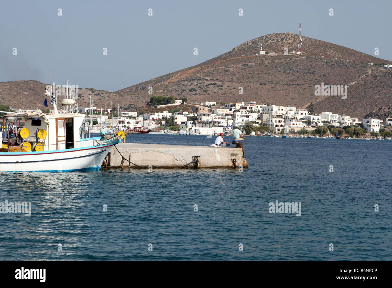fishing at the port of skala patmos island dodecanese greece Stock ...