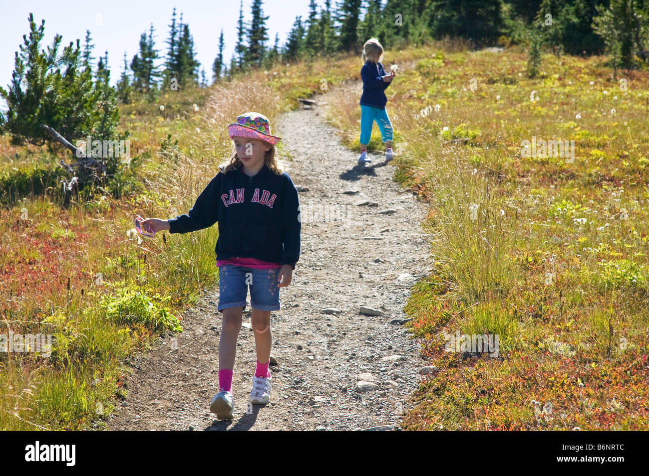 Two girls hiking hi-res stock photography and images - Alamy