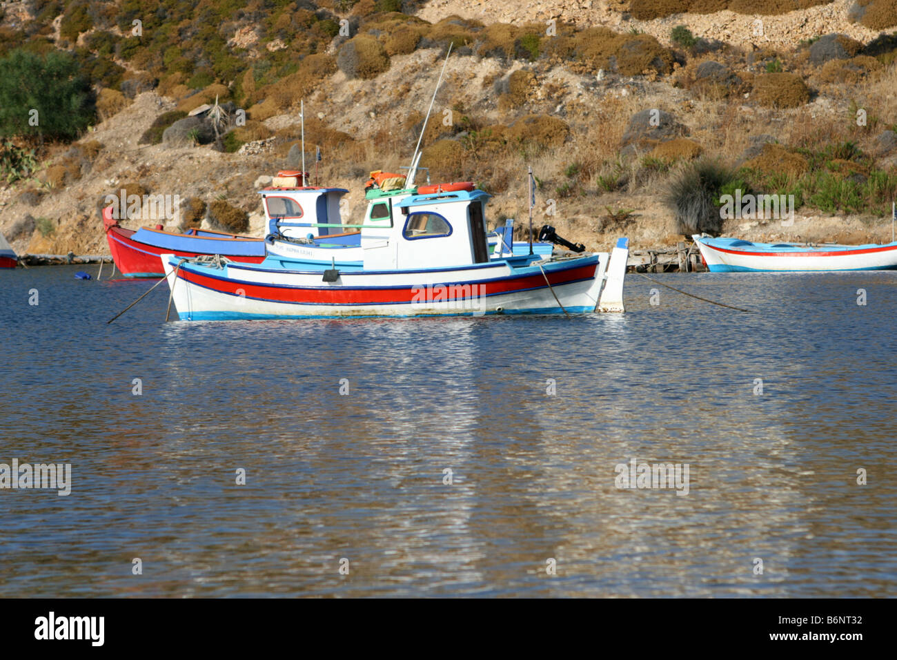 traditional greek fishing boats at harbor Stock Photo - Alamy