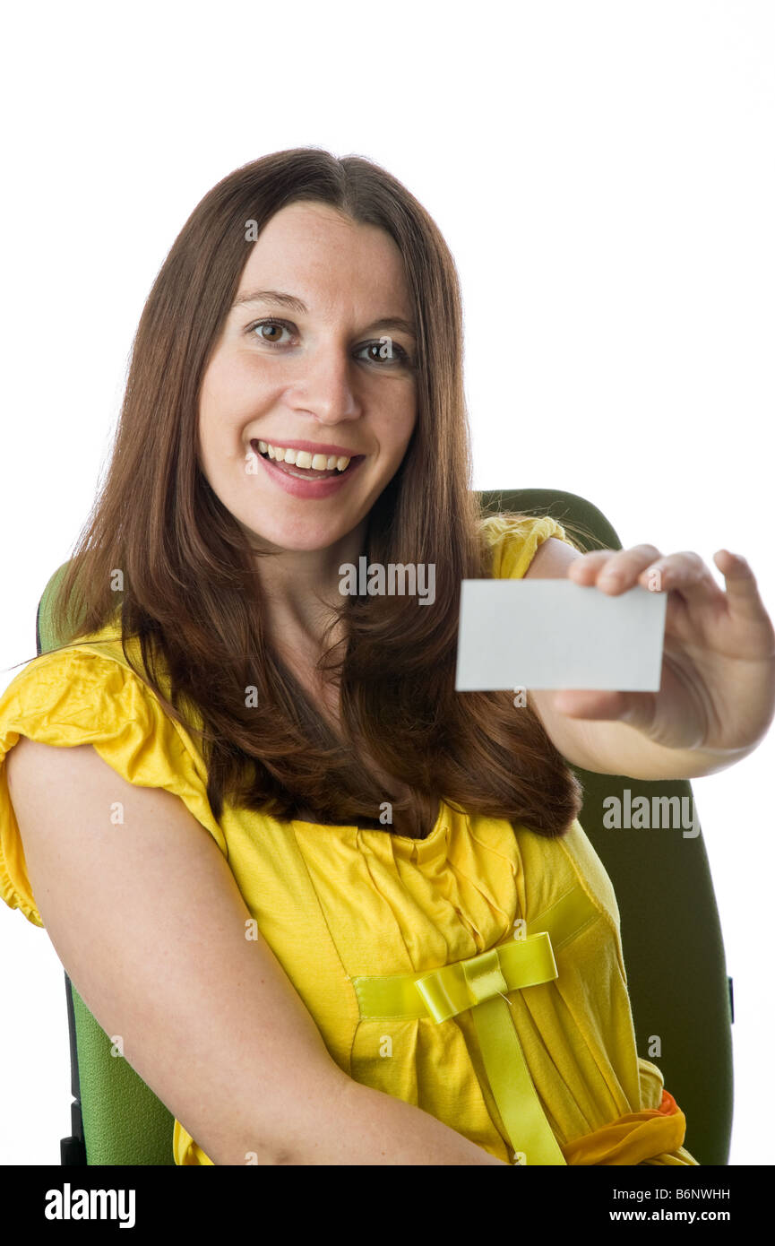 Pretty woman giving a business card against a white background Stock ...