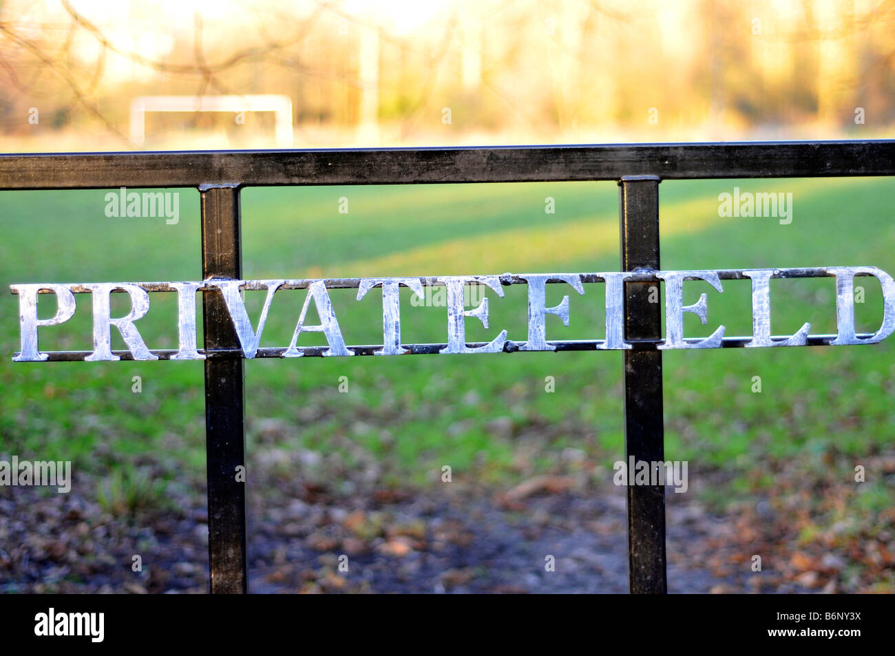 notice on gate indicating private field Stock Photo - Alamy