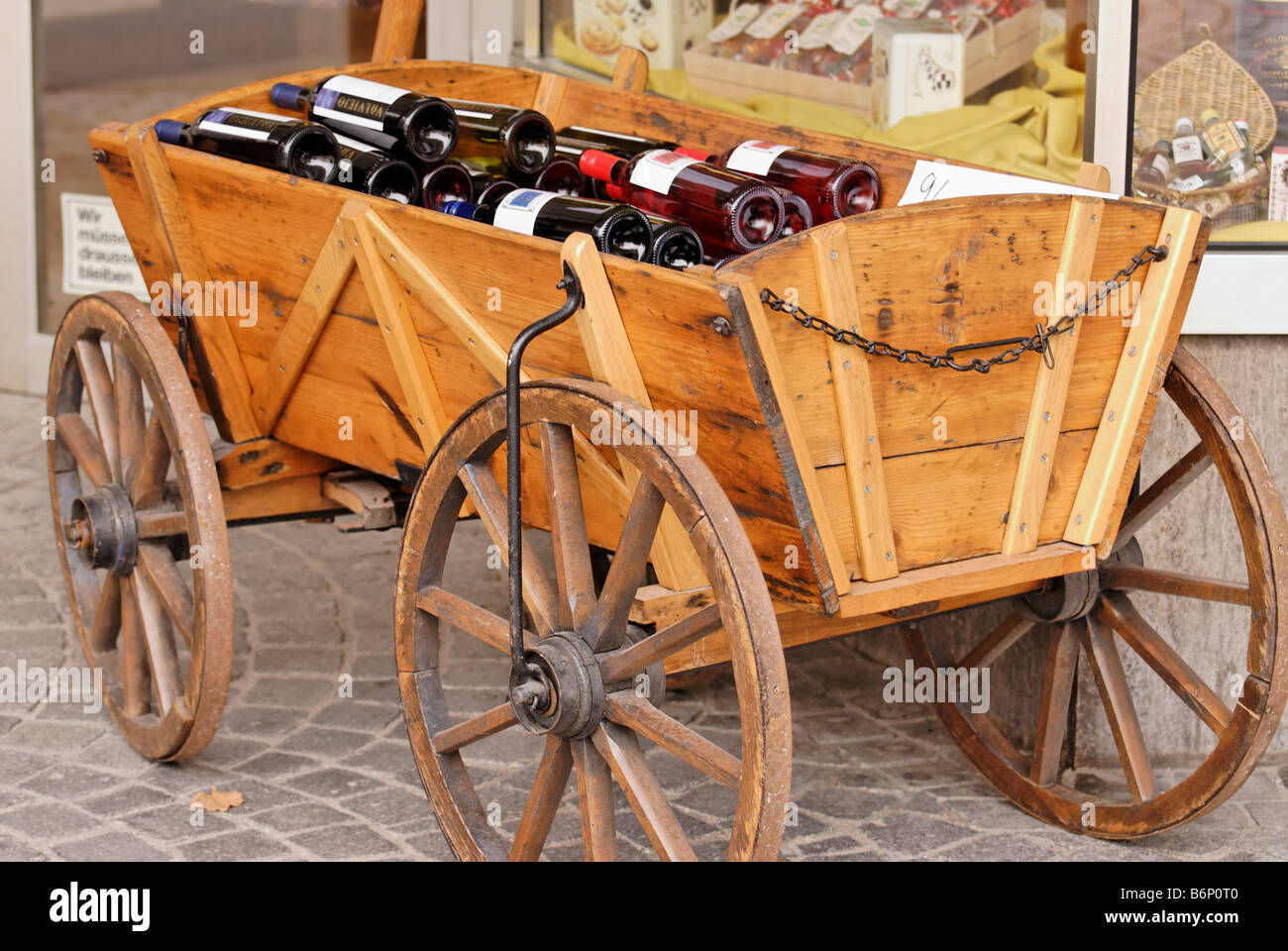 Country cart with bottles of wine on the street of Bielefeld city ...