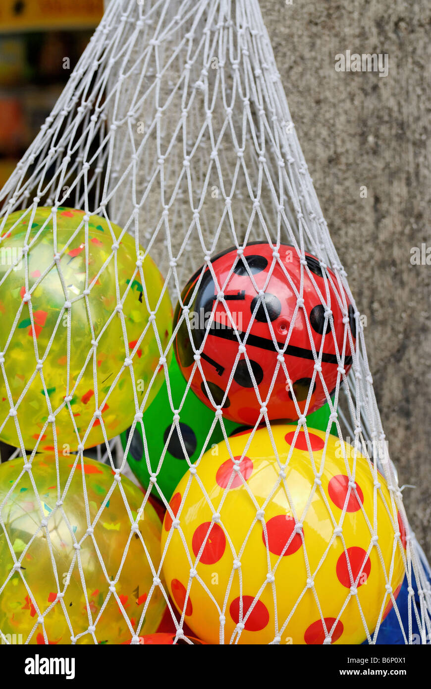 Color kids ball in net Stock Photo - Alamy