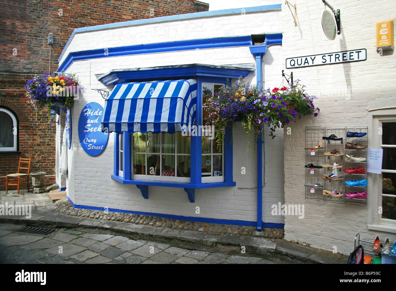 Brightly coloured shop on Quay Street Lymington Hampshire England UK ...