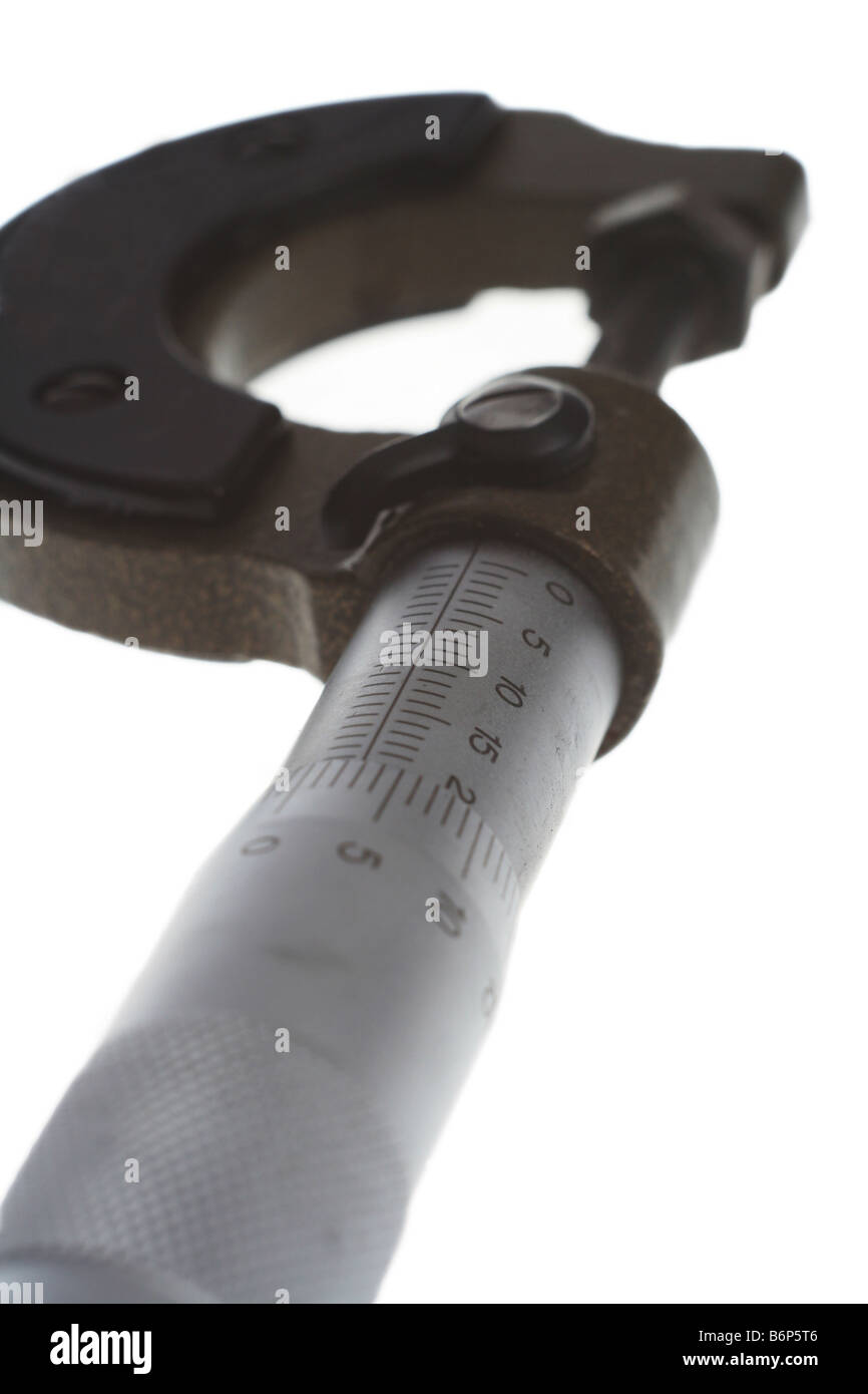 Micrometer close up taken while measuring bolt focus on scale Stock ...