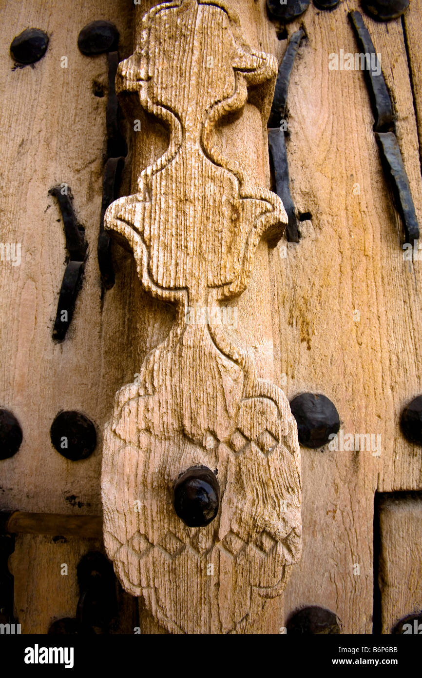 Oman, Muscat, Muttrah District. Wooden door, Muttrah Fort Stock Photo ...