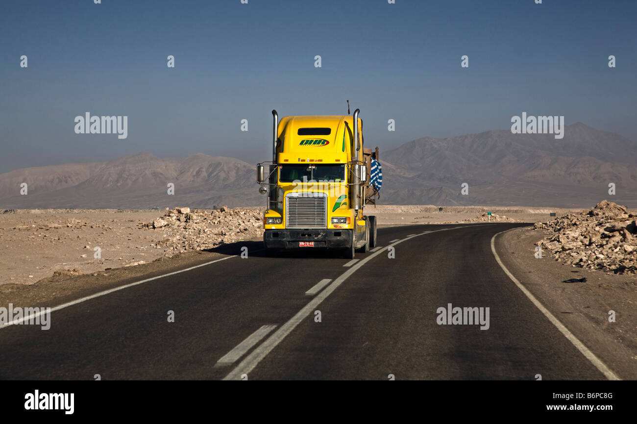 Yellow Truck driving through Atacama Desert near Calama, Chile Stock ...