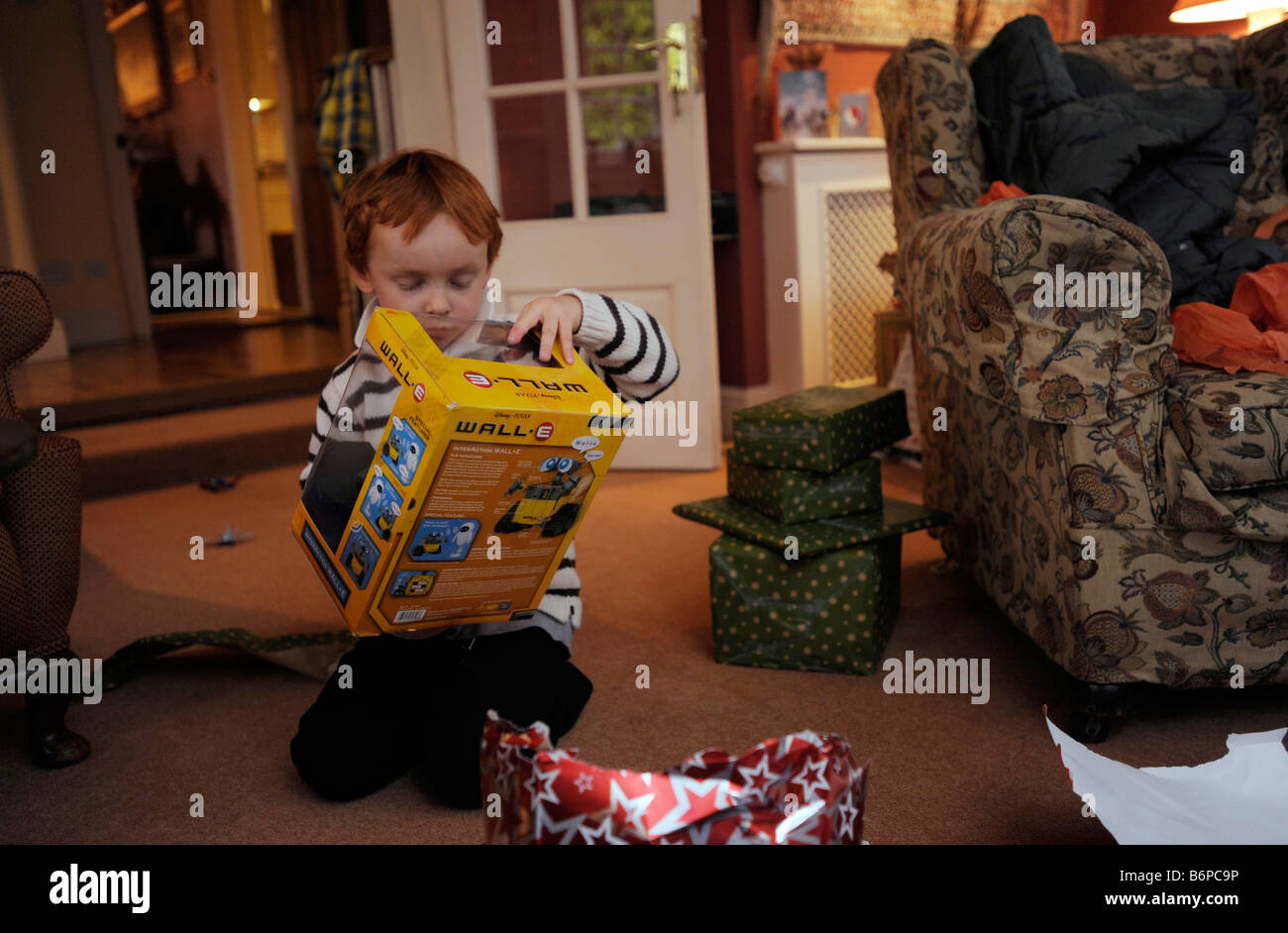 A 4yr Old Boy Unwraps Disney Wall E Xmas Gift Stock Photo Alamy a-4yr-old-boy-unwraps-disney-wall-e-xmas-gift-stock-photo-alamy