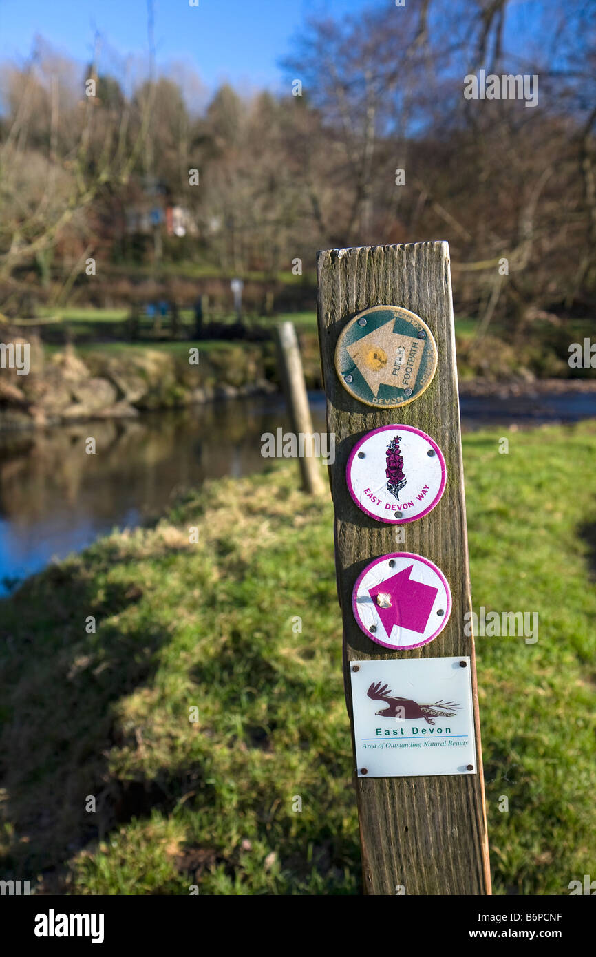 Post covered with signs for walkers in East Devon Stock Photo - Alamy