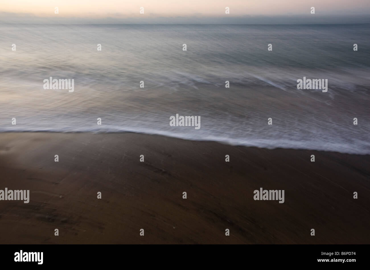 Moving sea and sand Stock Photo - Alamy