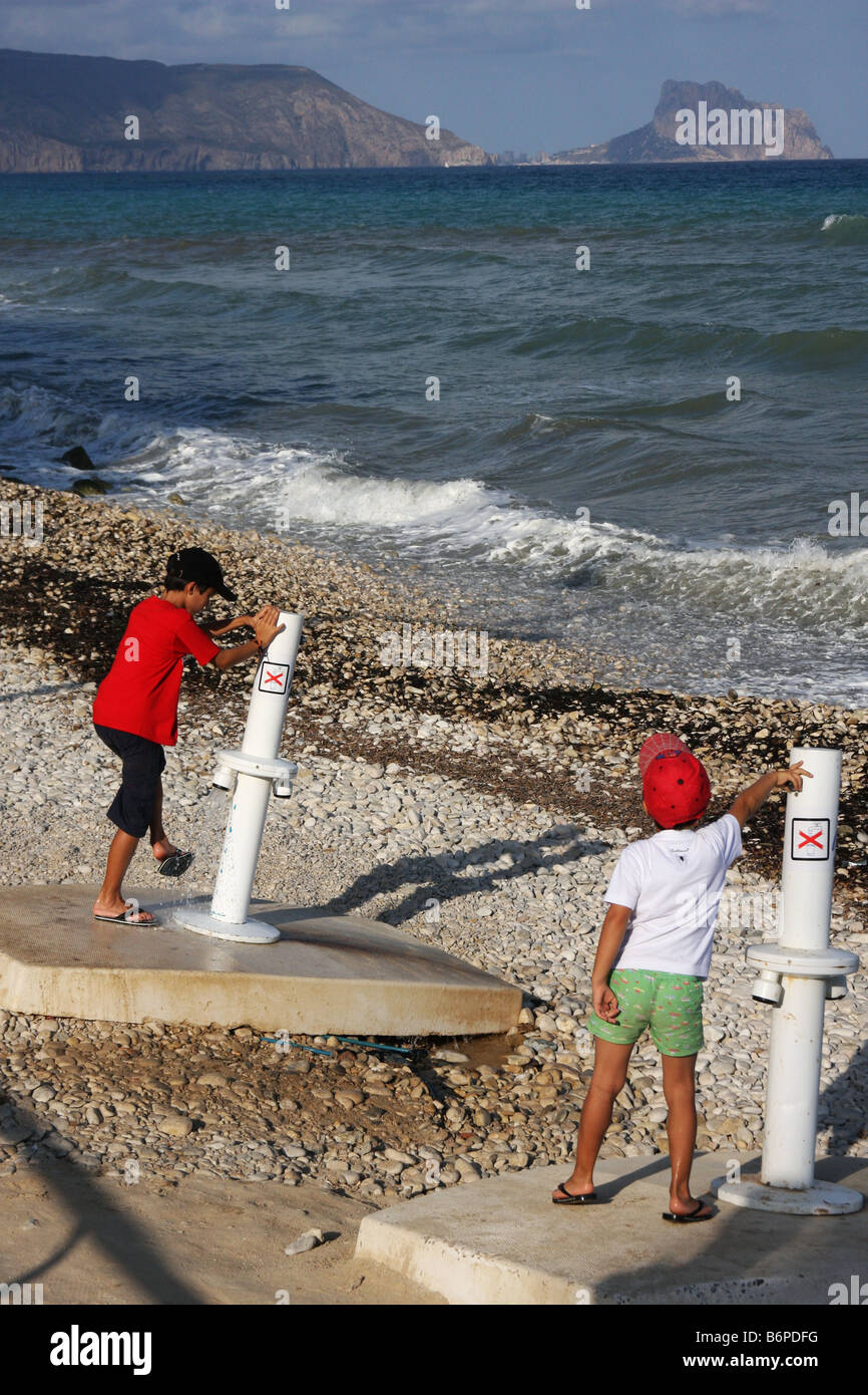 Kids playing on the beach hi-res stock photography and images - Alamy