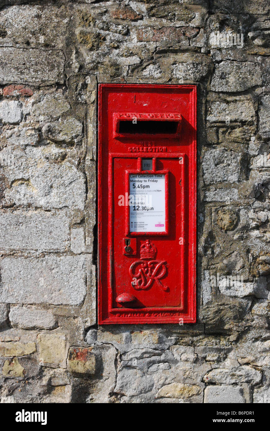 Post box set in a stone wall Stock Photo - Alamy