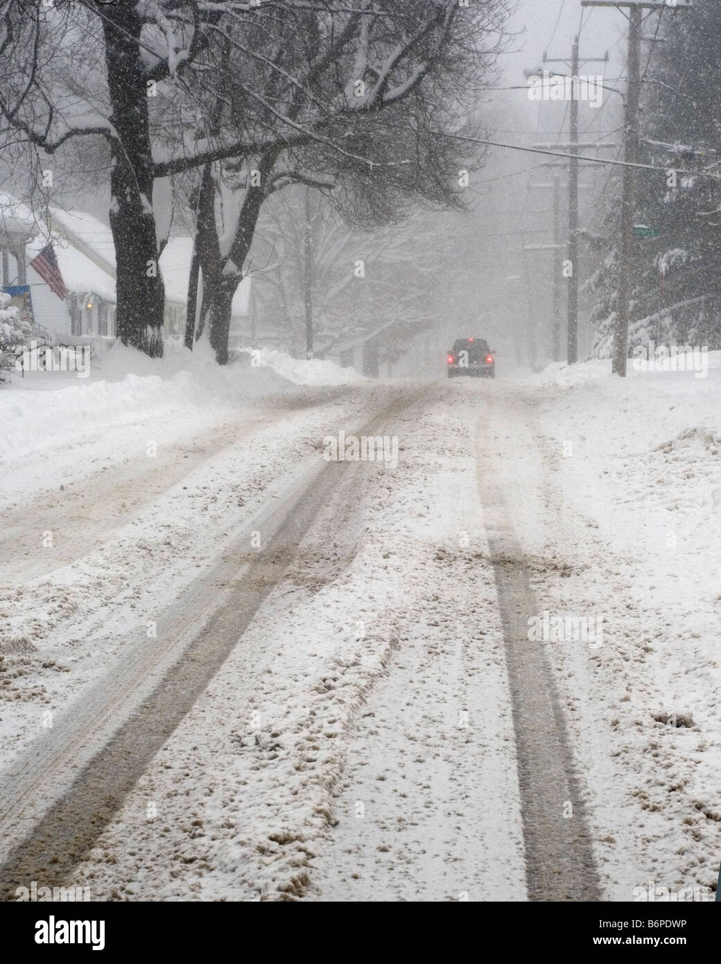 Car driving in winter storm on a snowy road Stock Photo - Alamy