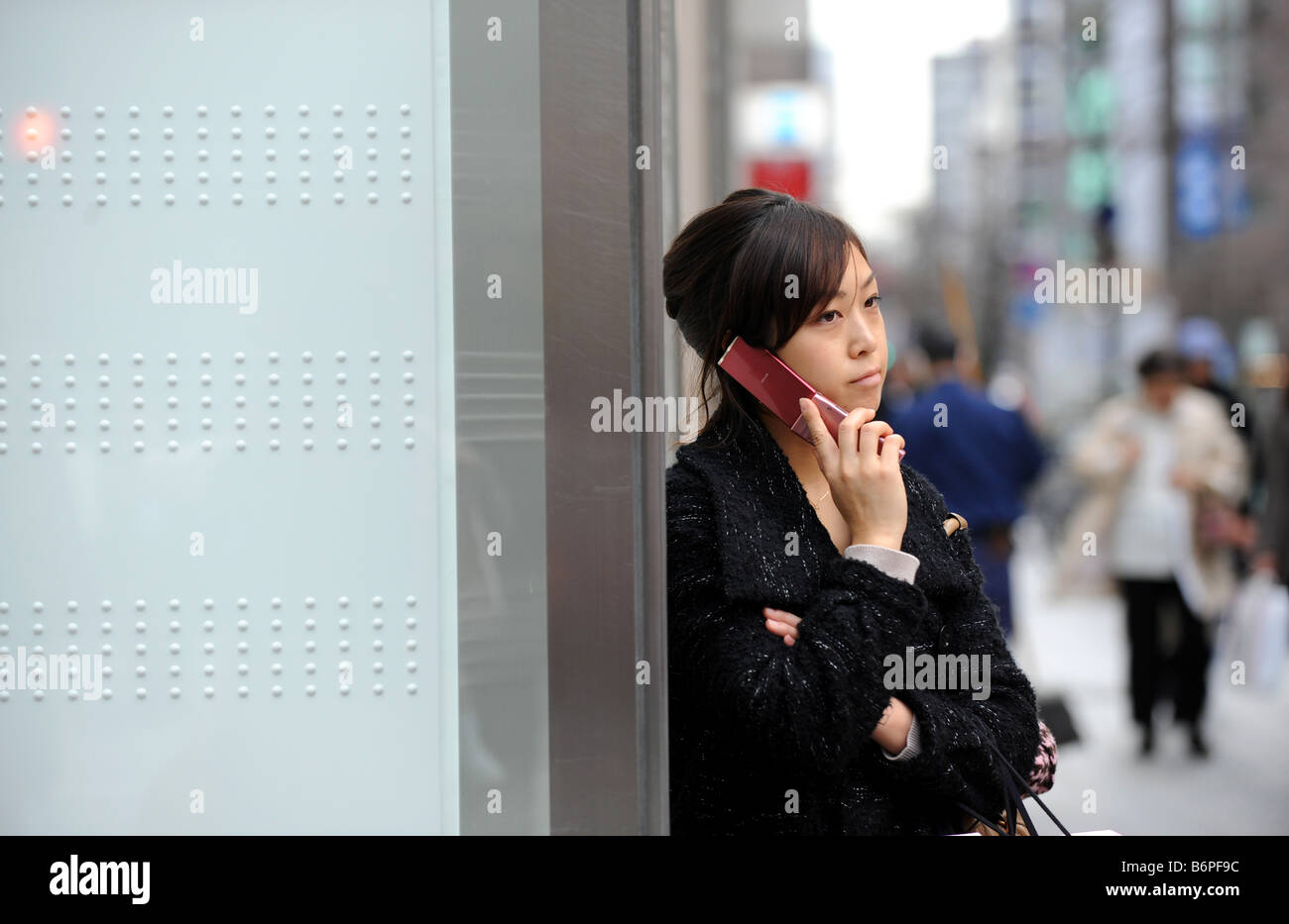 A Japanese girl talking on a mobile telephone Stock Photo - Alamy