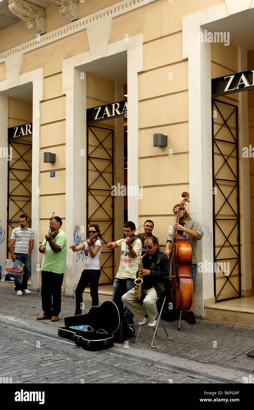 A street busking band in Plaka, Athens Stock Photo - Alamy