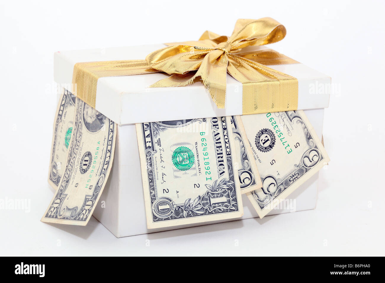 expensive white gift box with gold ribbon and bow and dollars Stock ...