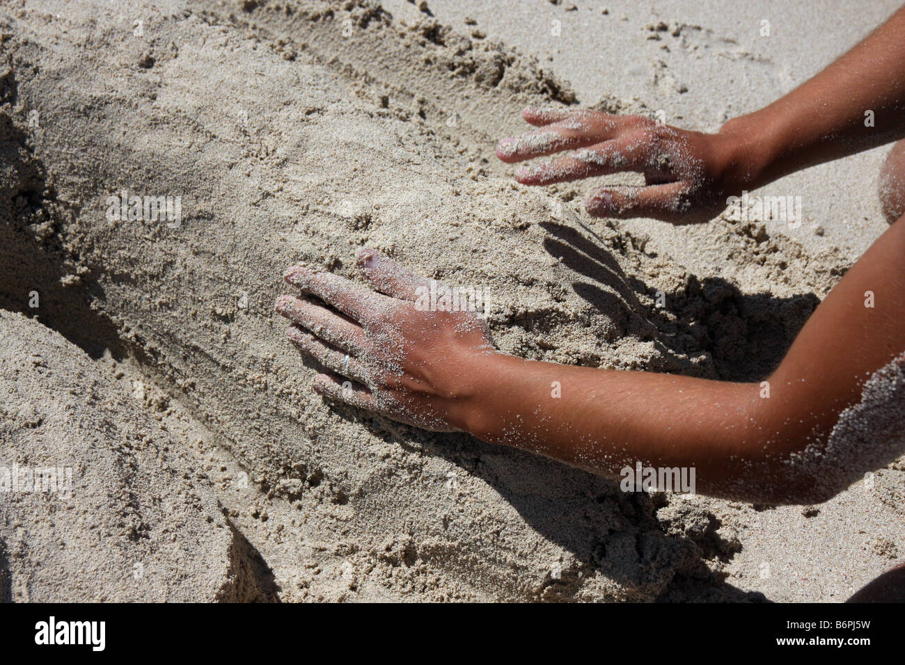Children playing sand sculpture High Resolution Stock Photography and ...