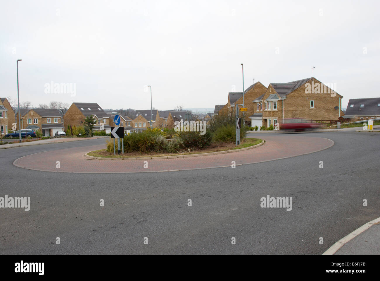 roundabout on a new housing estate Stock Photo - Alamy
