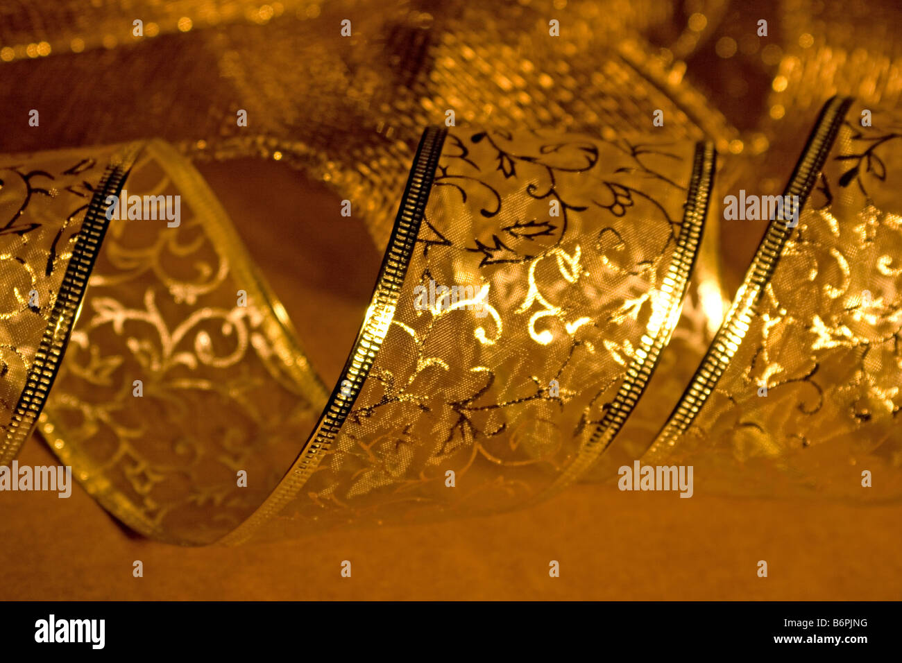 Golden with ribbon hi-res stock photography and images - Alamy