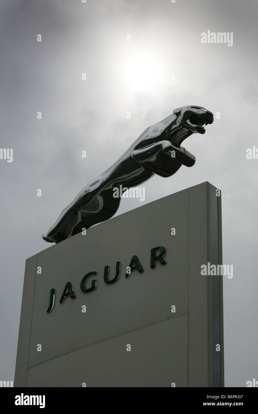 Jaguar car dealers showroom sign Stock Photo - Alamy