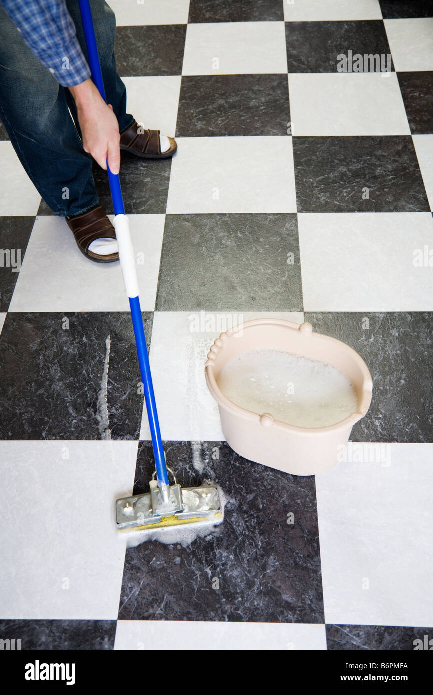 Floor tiles bucket mop hi-res stock photography and images - Alamy