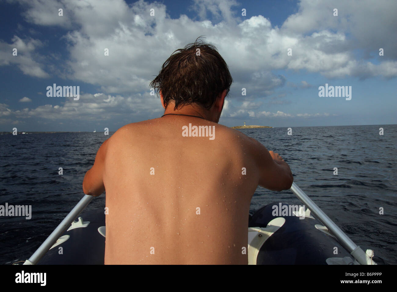 Row rowing sea water boat back sport hi-res stock photography and ...