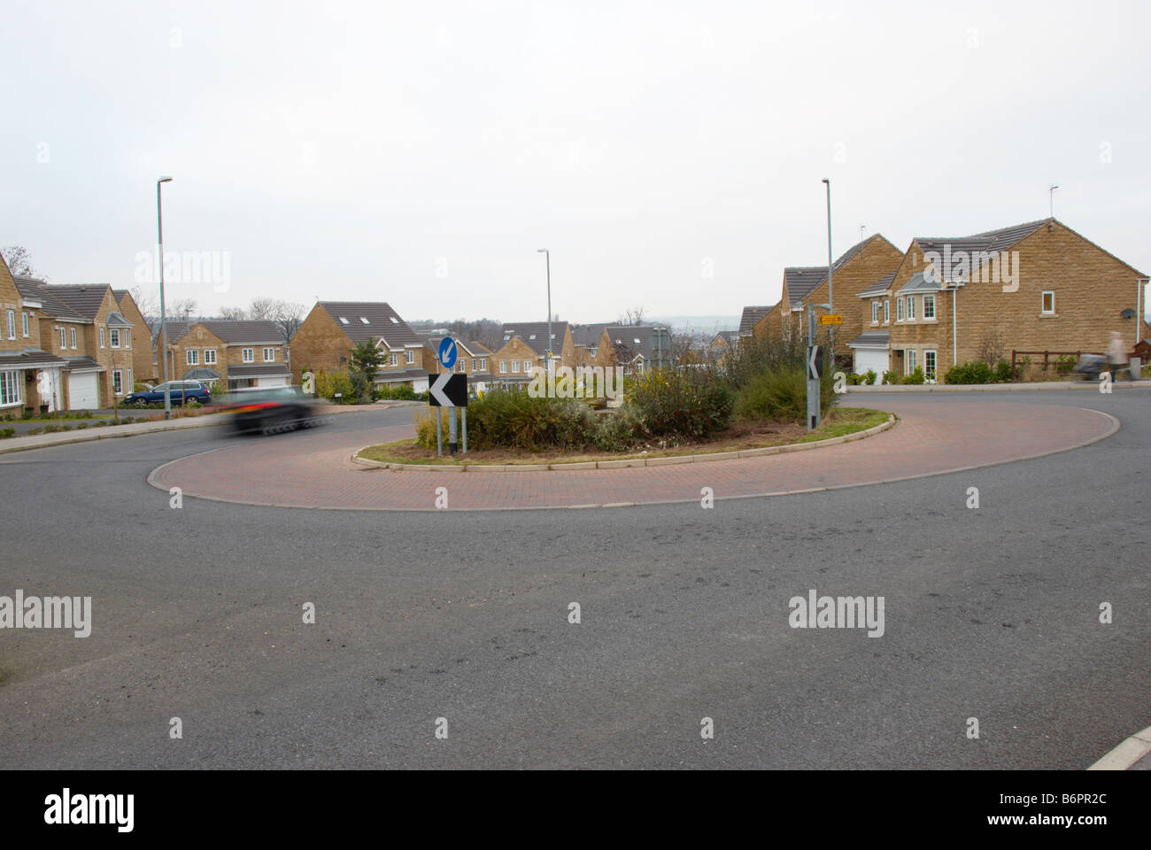 roundabout on a new housing estate Stock Photo - Alamy