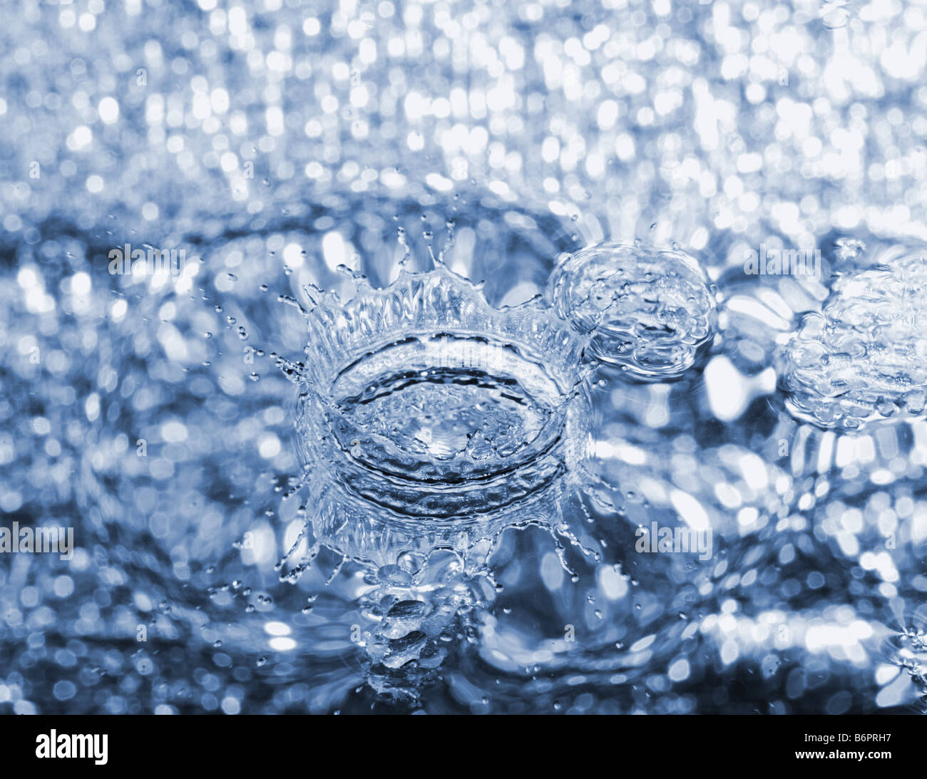 Splash A water table with effective drops stains on water Stock Photo ...