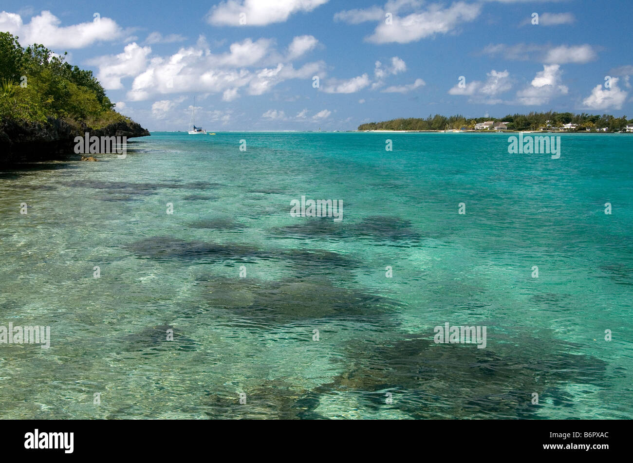Coral reef and turquoise ocean between Ile aux Aigrettes and the ...