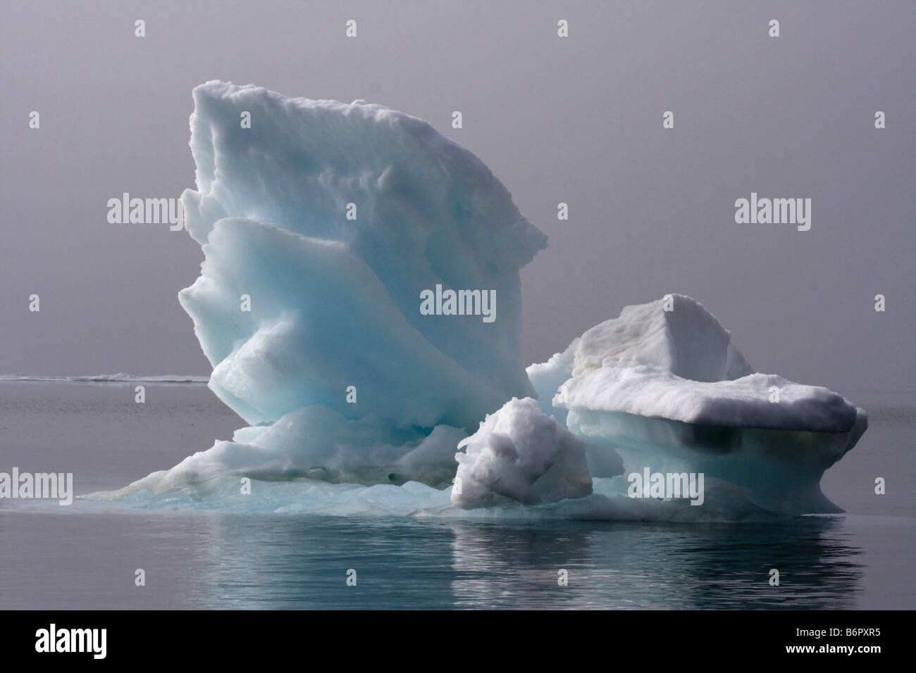 Small iceberg in waters hi-res stock photography and images - Alamy